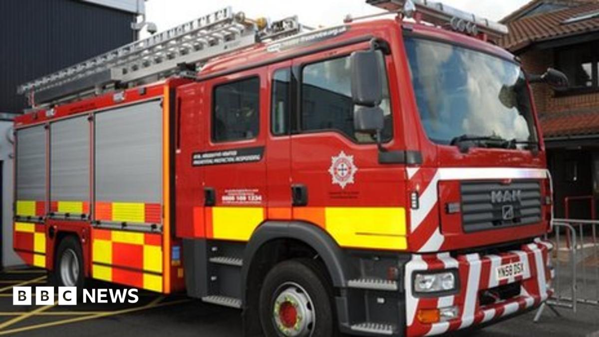 Two people in hospital after Prestatyn flat fire - BBC News