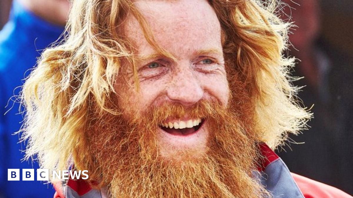 Adventurer Sean Conway completes 'ultimate triathlon' - BBC News
