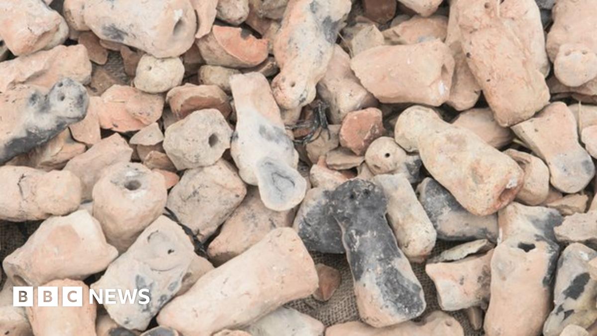 Artist Liz Crow's austerity mud figures ground up - BBC News