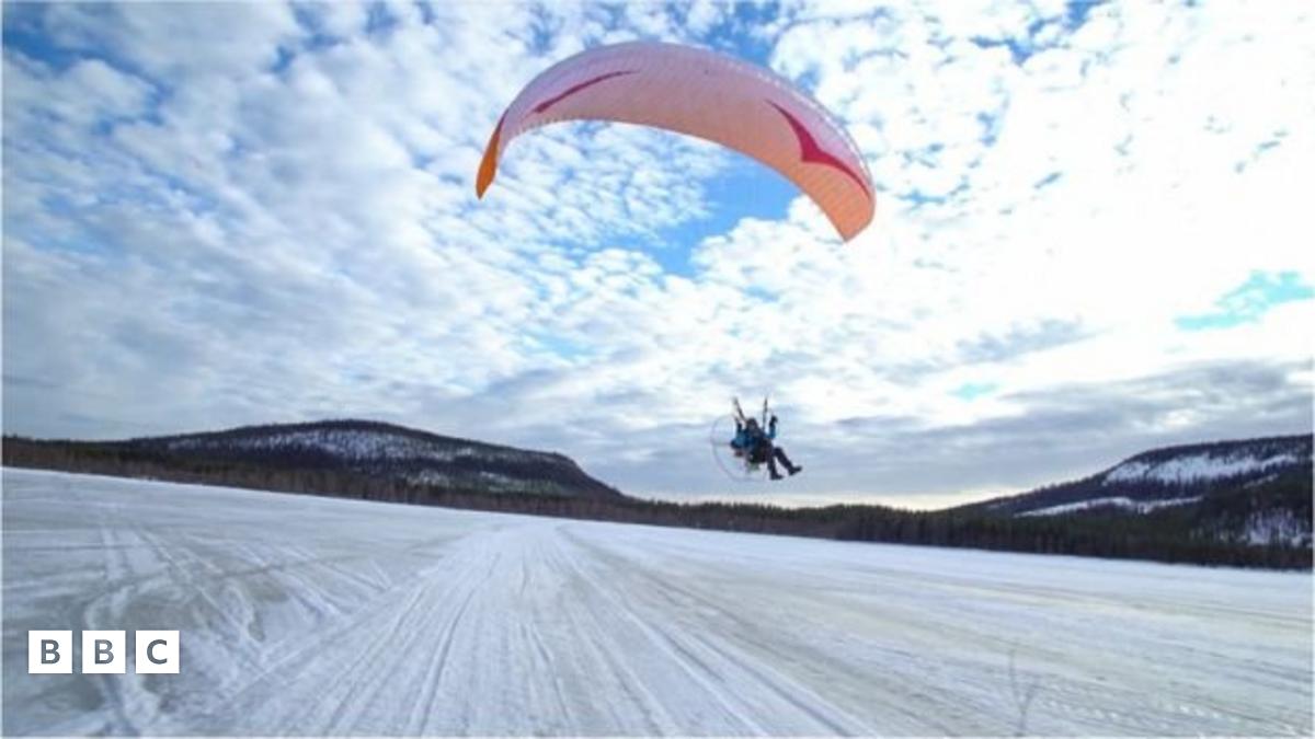 'Human swan' crosses the Channel and arrives in the UK - BBC Newsround