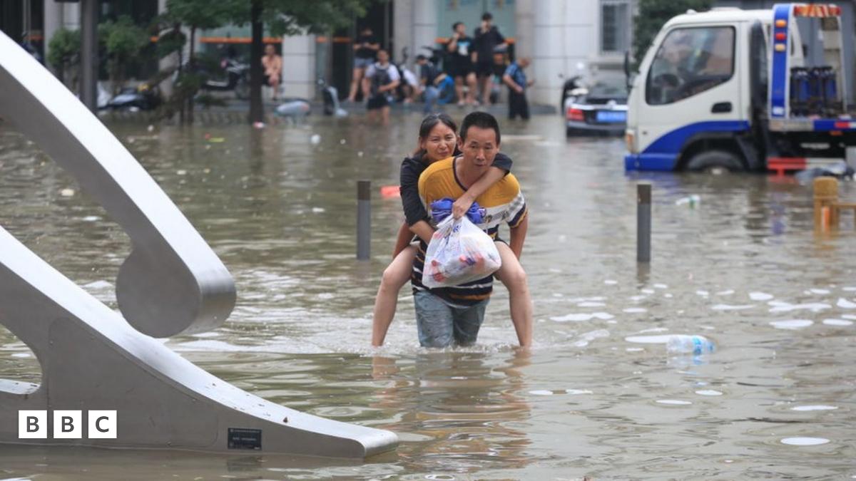 China floods: Rescue efforts underway and thousands evacuated - BBC ...