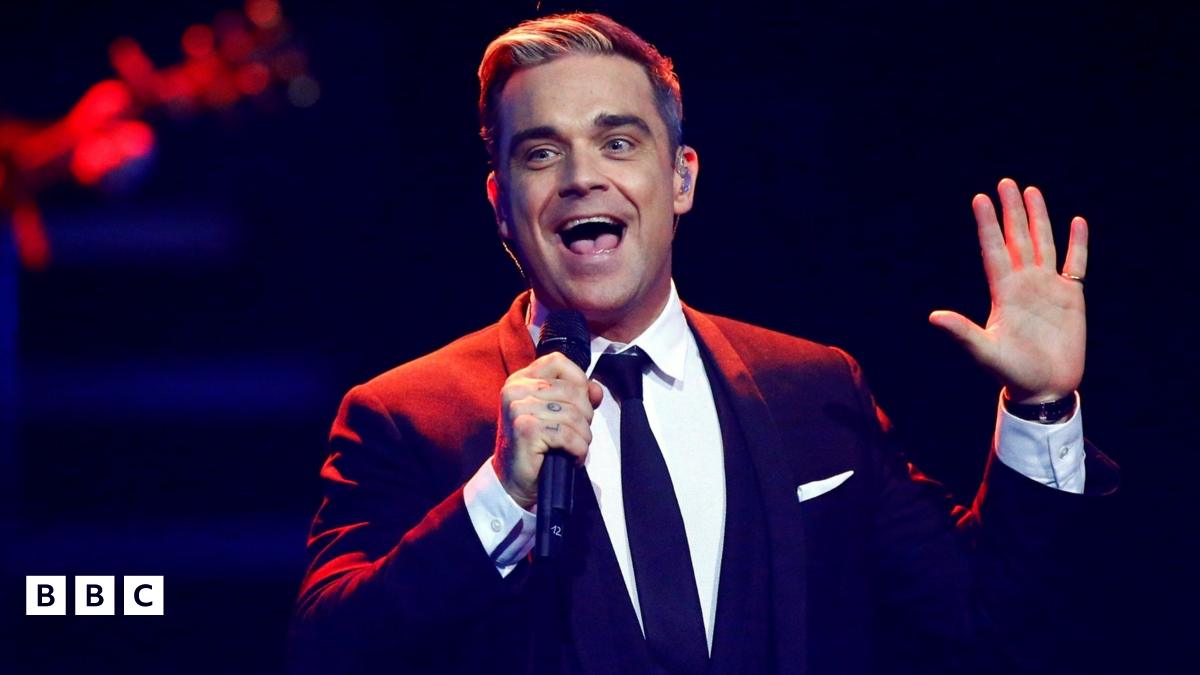 Robbie Williams gets 1,000th UK number one album - BBC Newsround