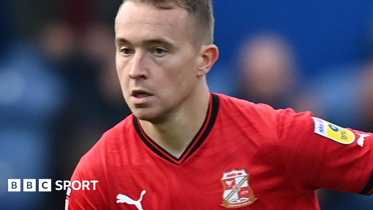 Louis Reed: Mansfield sign Swindon midfielder for undisclosed fee - BBC ...