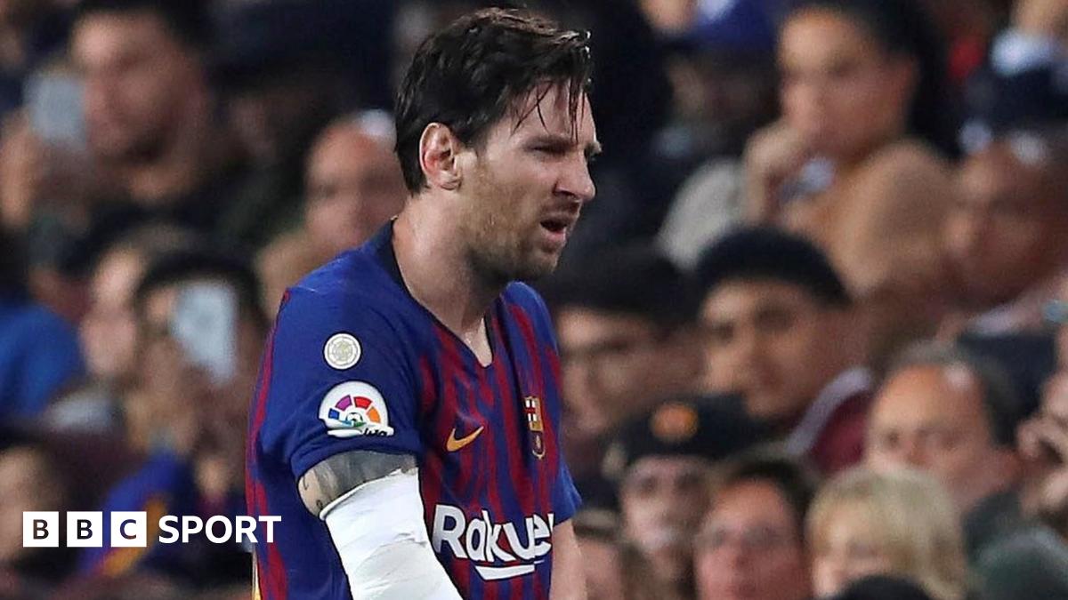 Lionel Messi suffers arm injury in Barcelona's win over Sevilla - BBC Sport