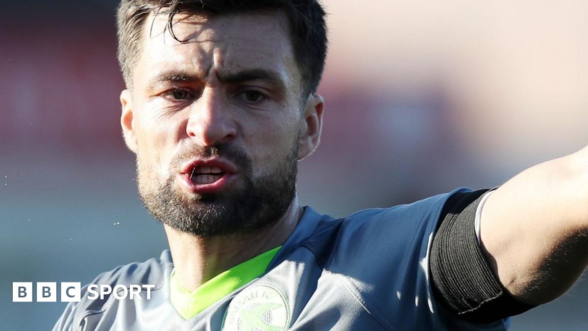 Russell Martin: Scotland international leaves Walsall for family ...