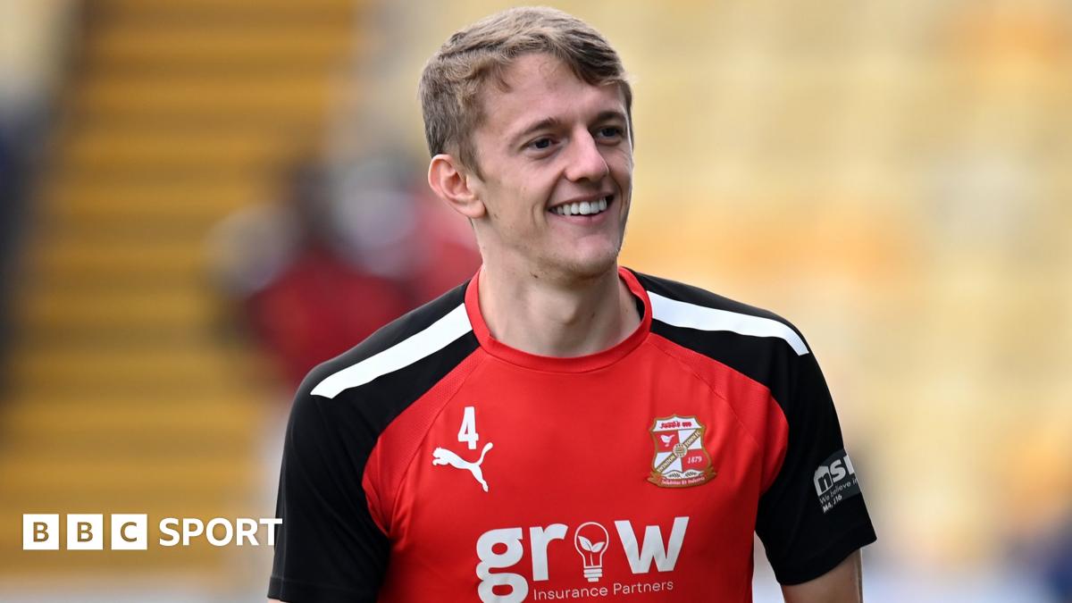 Tom Clayton: Swindon defender says squad is capable of reaching the ...