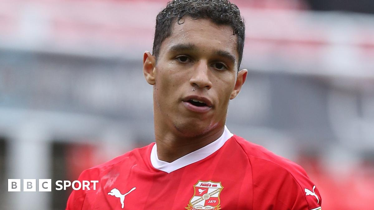 Kyle Knoyle: Cambridge sign Swindon defender on a two-year deal - BBC Sport
