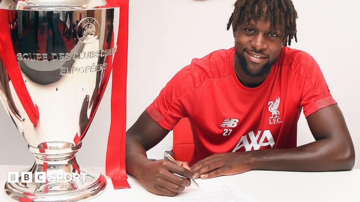 Divock Origi: Liverpool striker signs long-term contract - BBC Sport