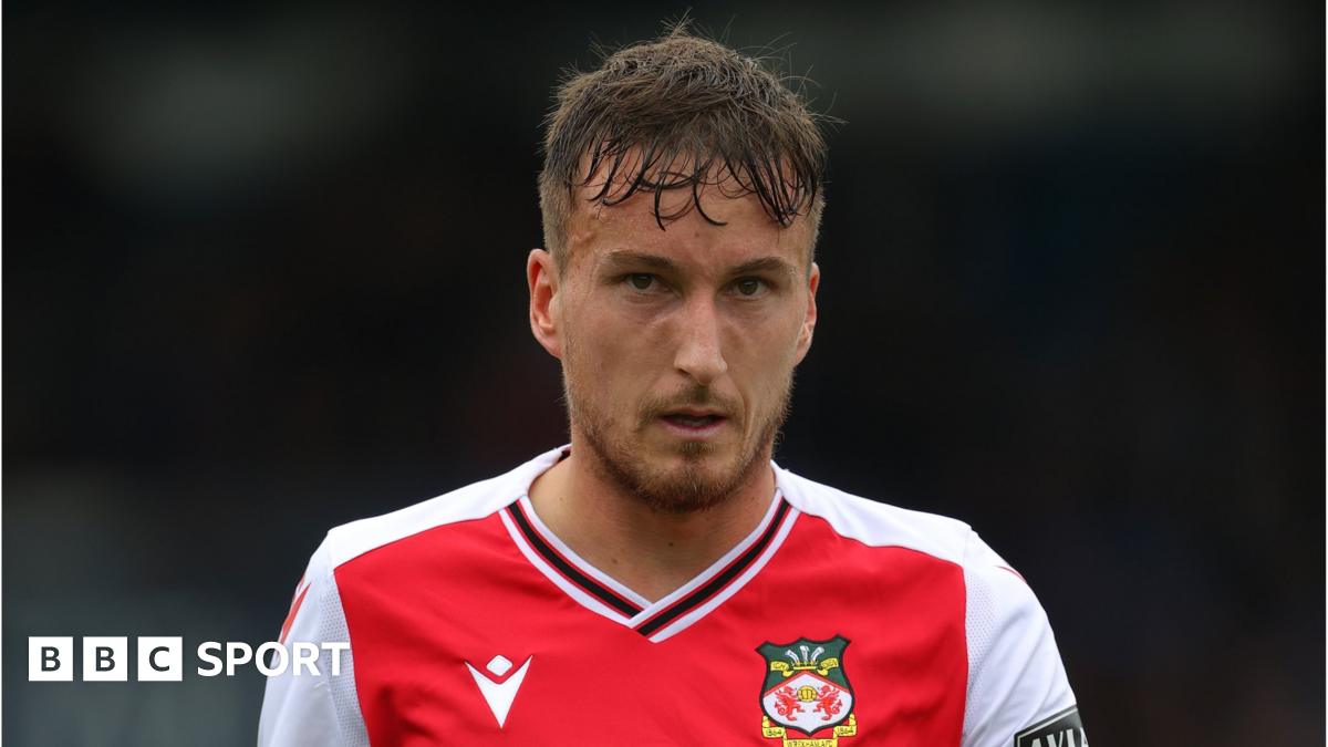 Luke Young: Wrexham captain has contract extended 12 months - BBC Sport