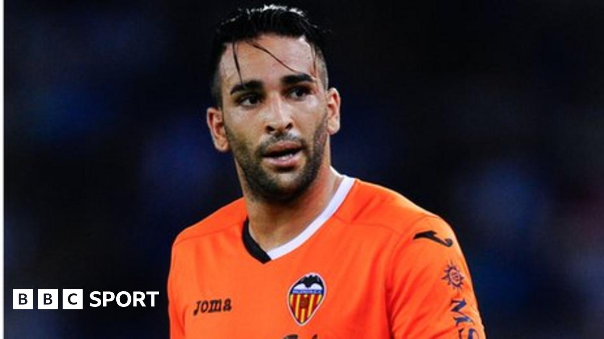 Adil Rami: AC Milan to sign Valencia defender on loan - BBC Sport