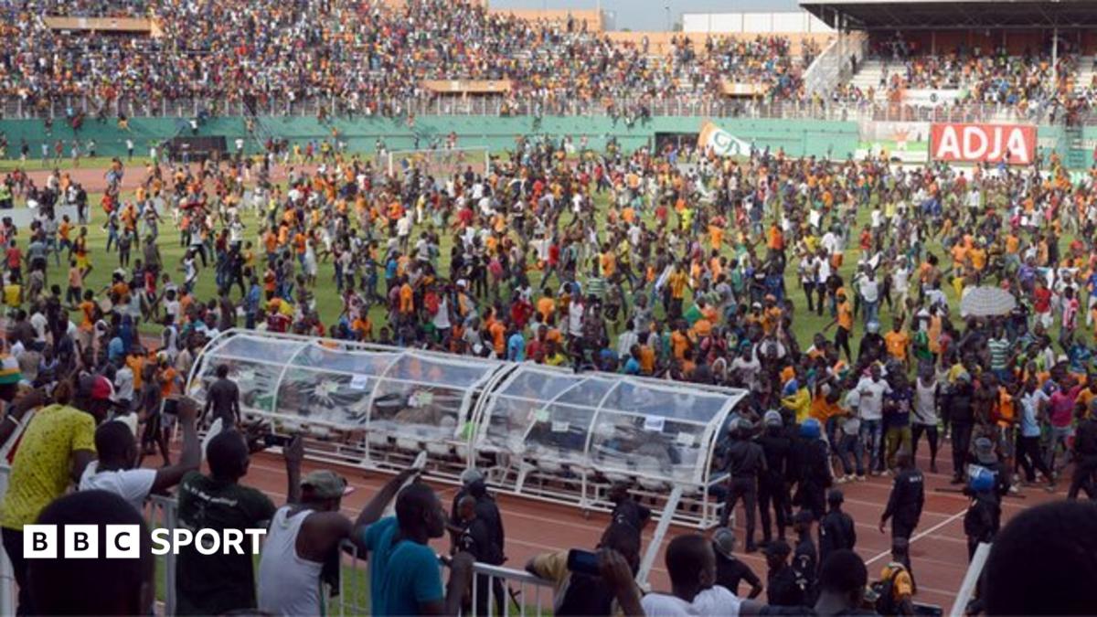 Ivory Coast could face sanctions over pitch invasion - BBC Sport