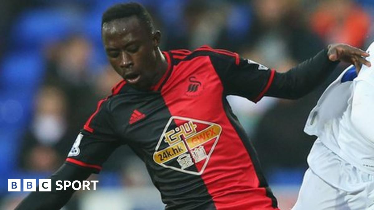 Gambian forward Modou Barrow signs long-term Swansea deal - BBC Sport