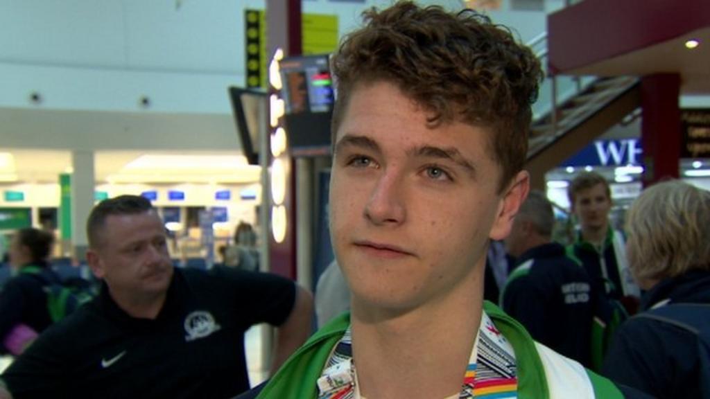 NI team home after Commonwealth Youth Games success - BBC Sport