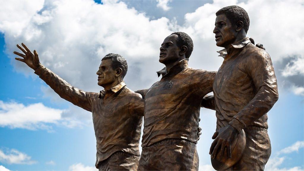 Statue of Welsh rugby league legends Billy Boston, Gus Risman and Clive ...