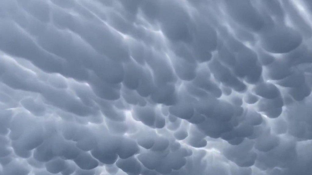 Rare red fiery 'udder clouds' spotted in UK skies - BBC Weather
