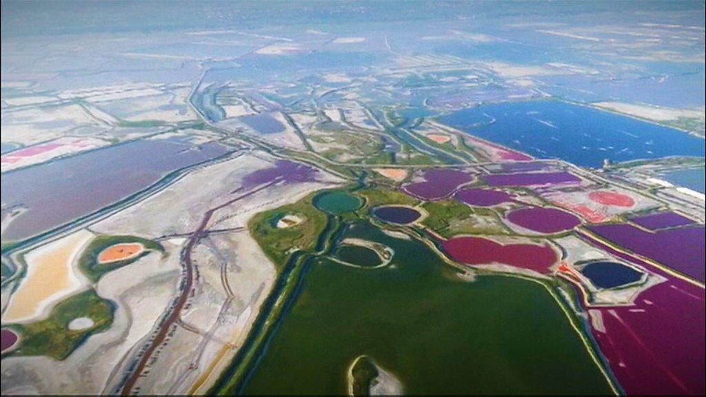 Rainbow lake: Is this the most colourful lake ever? - BBC Newsround