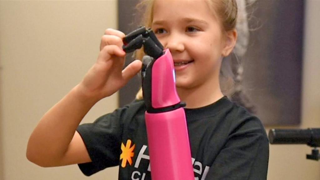 Watch: Girl, 8, tries out amazing bionic arm for the first time - BBC ...