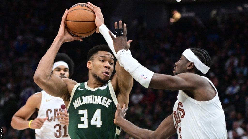NBA: Giannis Antetokounmpo leads Milwaukee Bucks to win in first game after coach Adrian Griffin ...