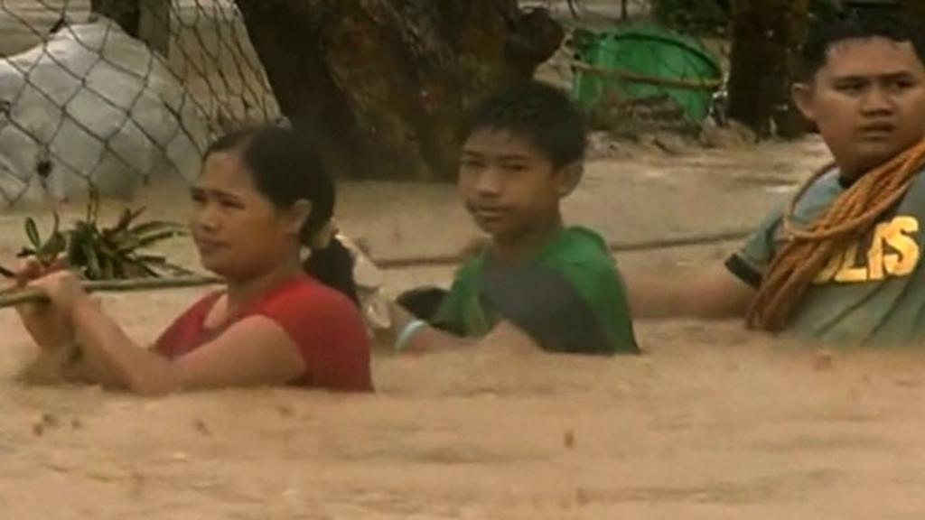 Philippines battered by huge typhoon - BBC Newsround