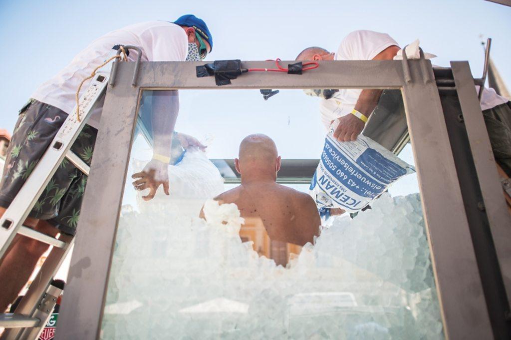 Why this man stood in a box of ice for more than two hours! - BBC Newsround