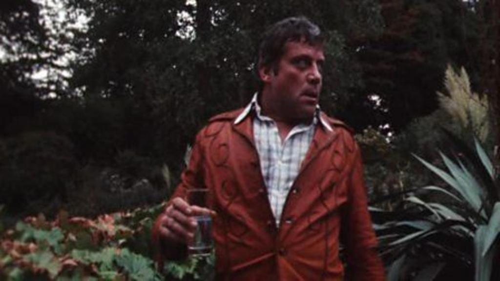 BBC Archive 1977 Oliver Reed in his garden - BBC