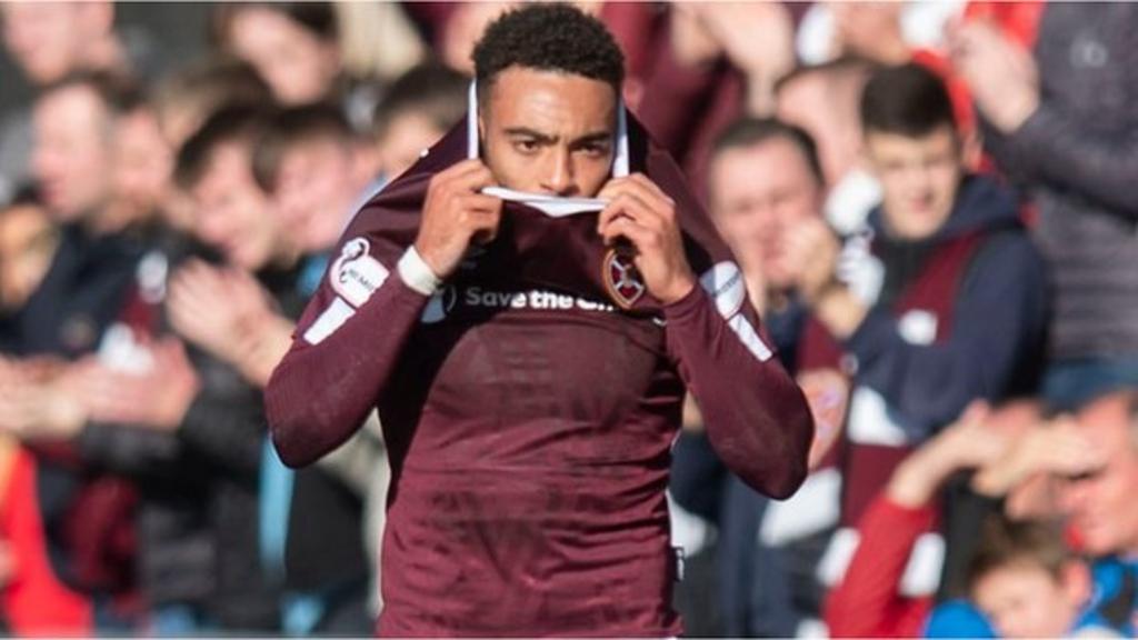 Watch: Hearts' Jake Mulraney tackles the assistant referee - BBC Sport