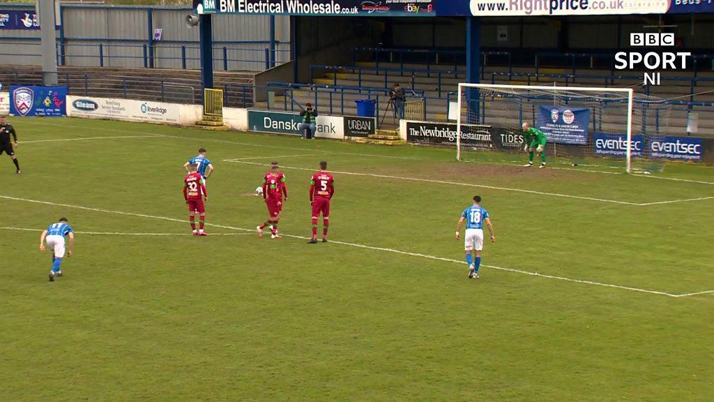 Ben Doherty scores the first of his two penalties against Cliftonville ...