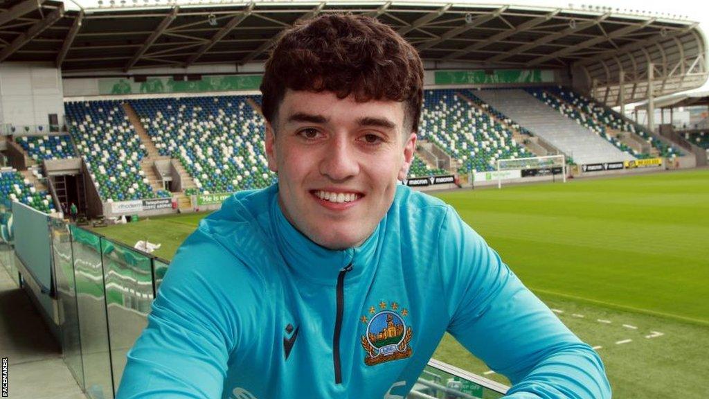 Linfield: Winger Darragh McBrien signs from Dungannon as Ethan Devine ...