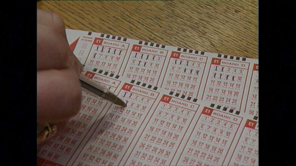 BBC Archive 1994: UK's first lottery draw - BBC