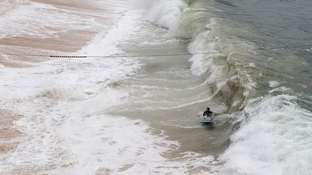 Australia: Boy fighting for life after being mauled by shark - BBC News