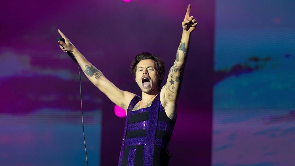 Harry Styles teases fourth album with cryptic posters - BBC News