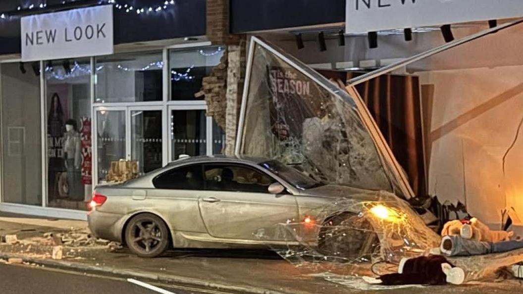 BMW crashes into front of New Look shop in Beccles - BBC News