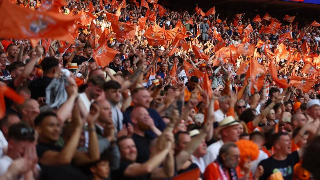 Luton Town: 'Getting promoted has put a smile on people's faces' - BBC ...