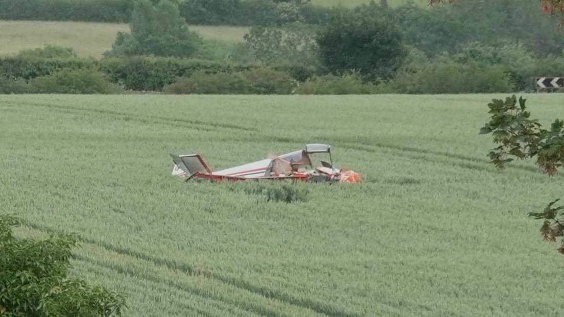 Northampton light aircraft crash injuries 'not life-threatening' - BBC News