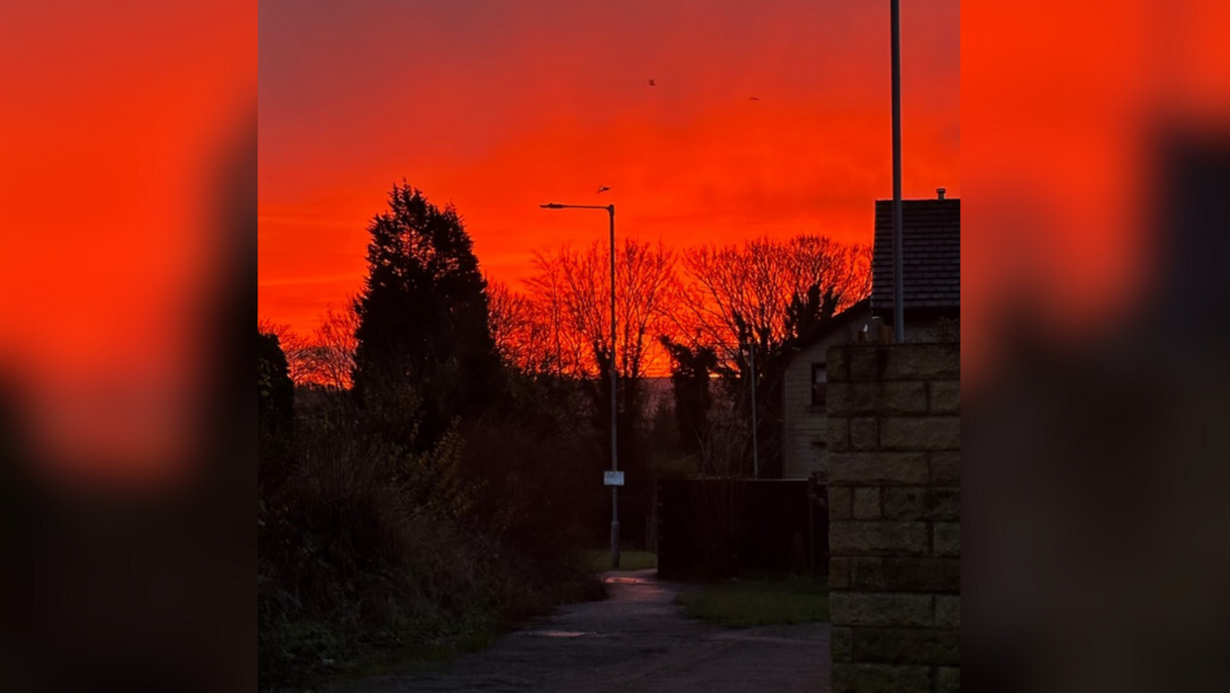 Fiery red skies spotted across Greater Manchester - BBC News