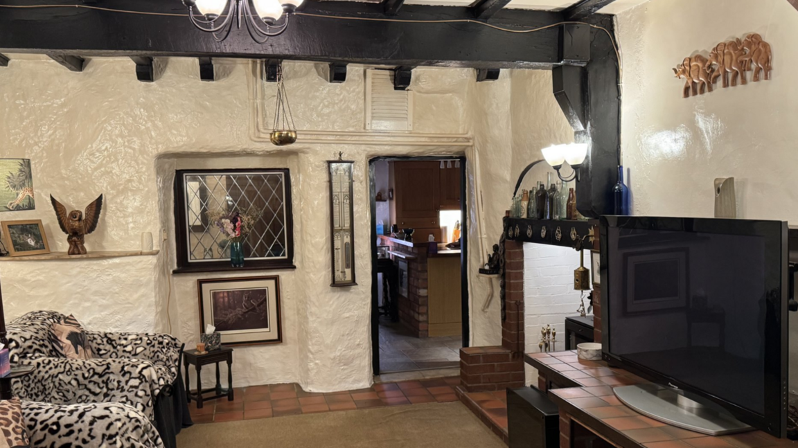 Kidderminster cave house dating back to 1511 up for auction - BBC News