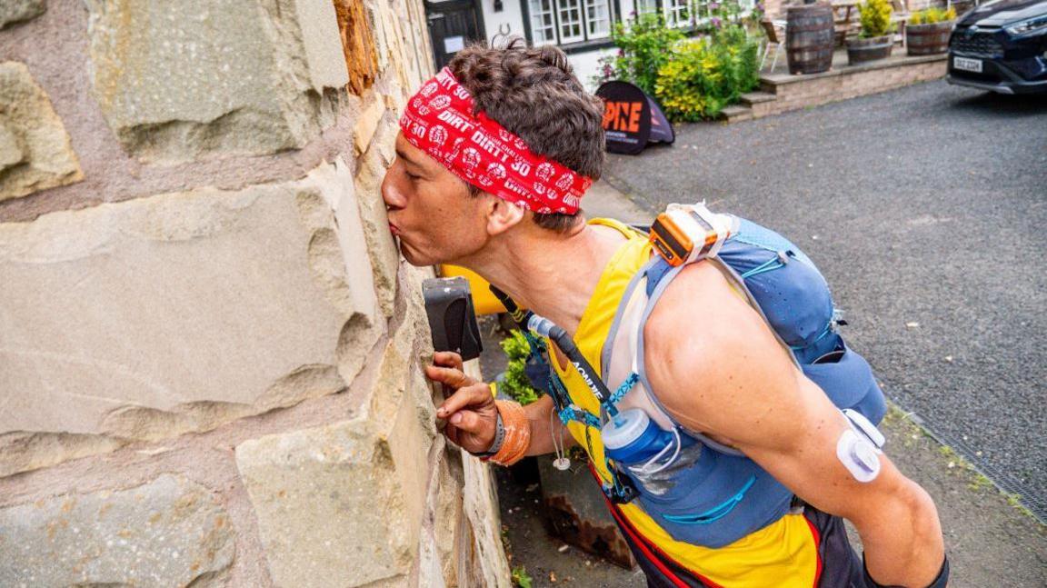 GP with diabetes sends message after endurance race win - BBC News