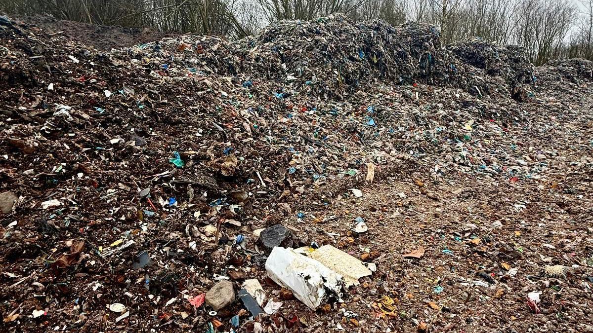 Massive illegal rubbish dump discovered near M57 in Kirkby - BBC News