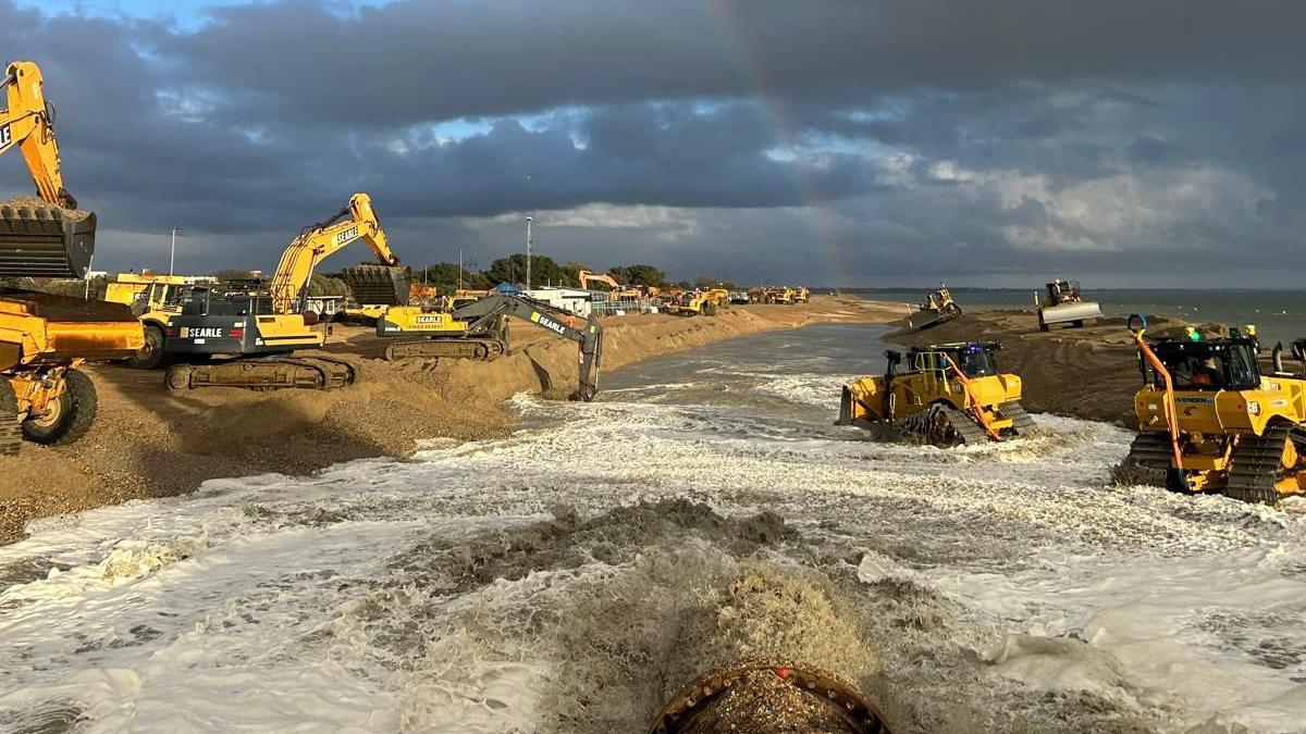 Section of Southsea beach reopens after shingle piped ashore - BBC News