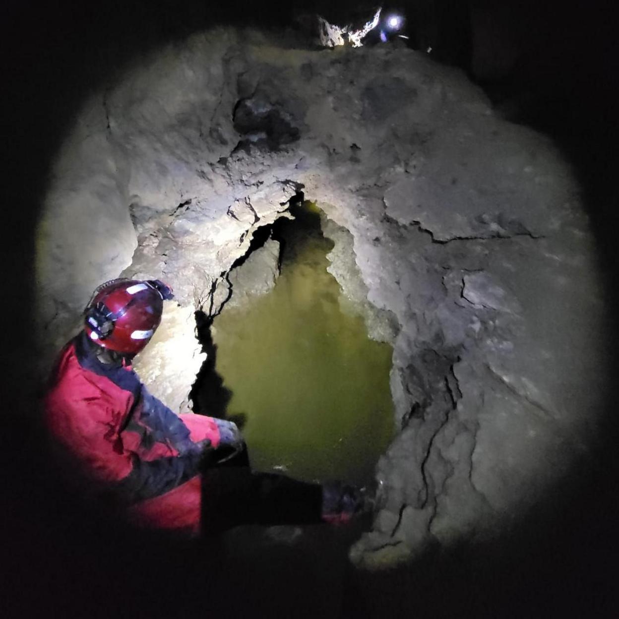 Caver rescued after getting stuck in Highland cave system - BBC News