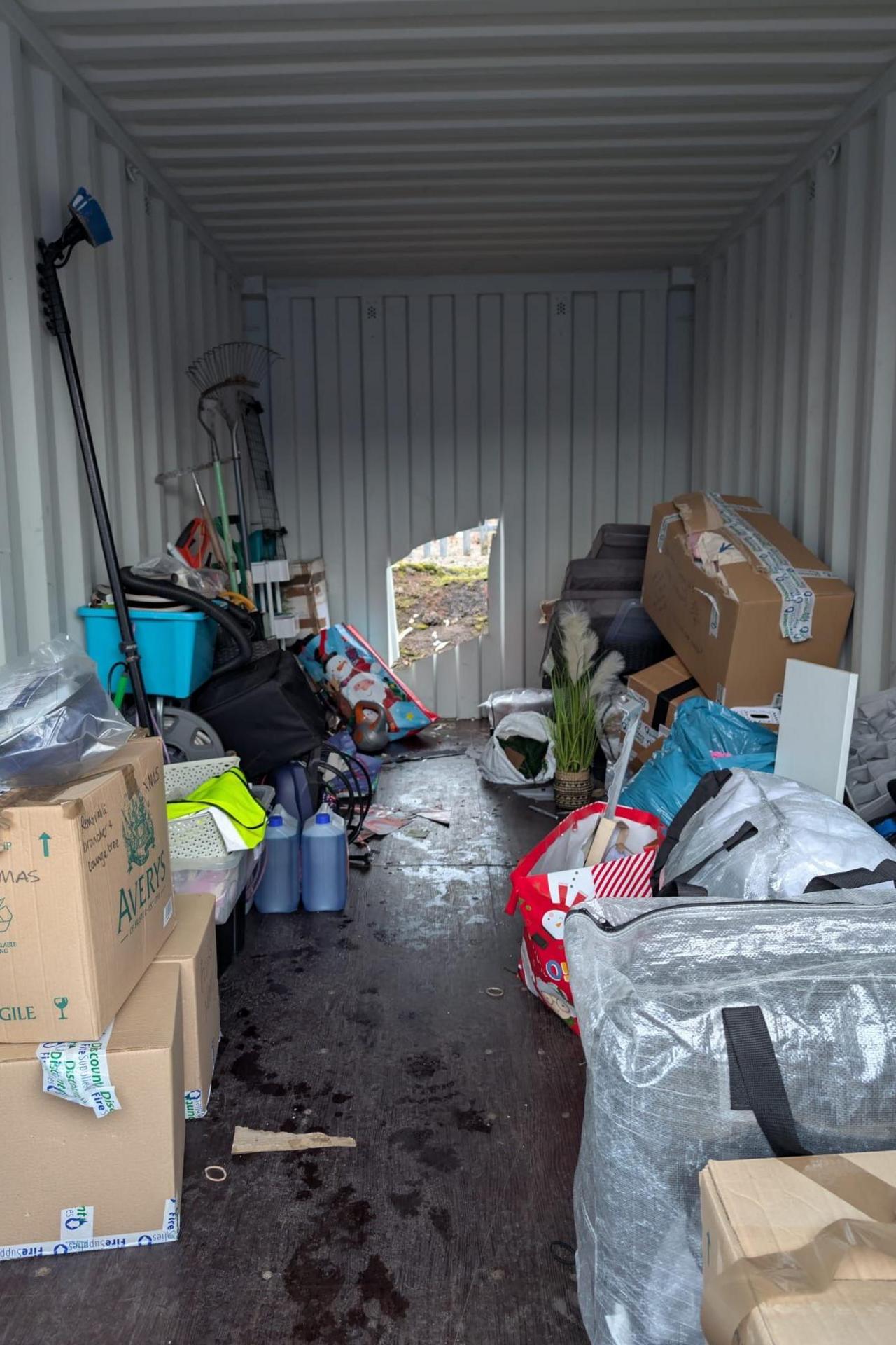 Port Tennant storage unit break-in leaves items strewn on road - BBC News