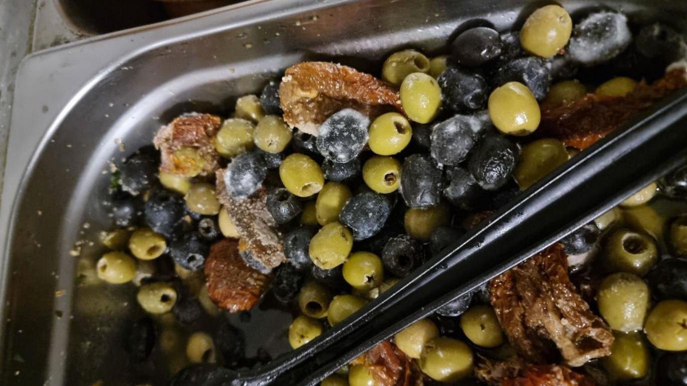 Slime, 'rancid' cheese and mice found in Wallasey restaurant - BBC News