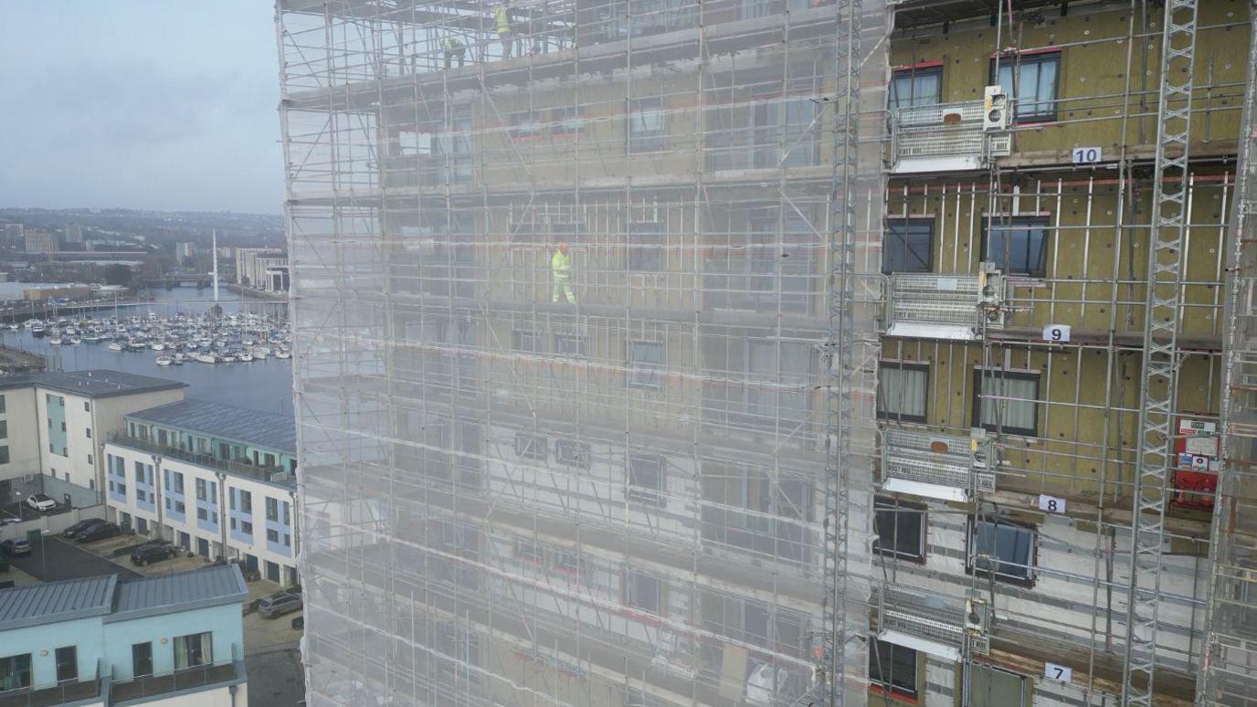 Swansea flat owners take action against insurance firm Zurich - BBC News