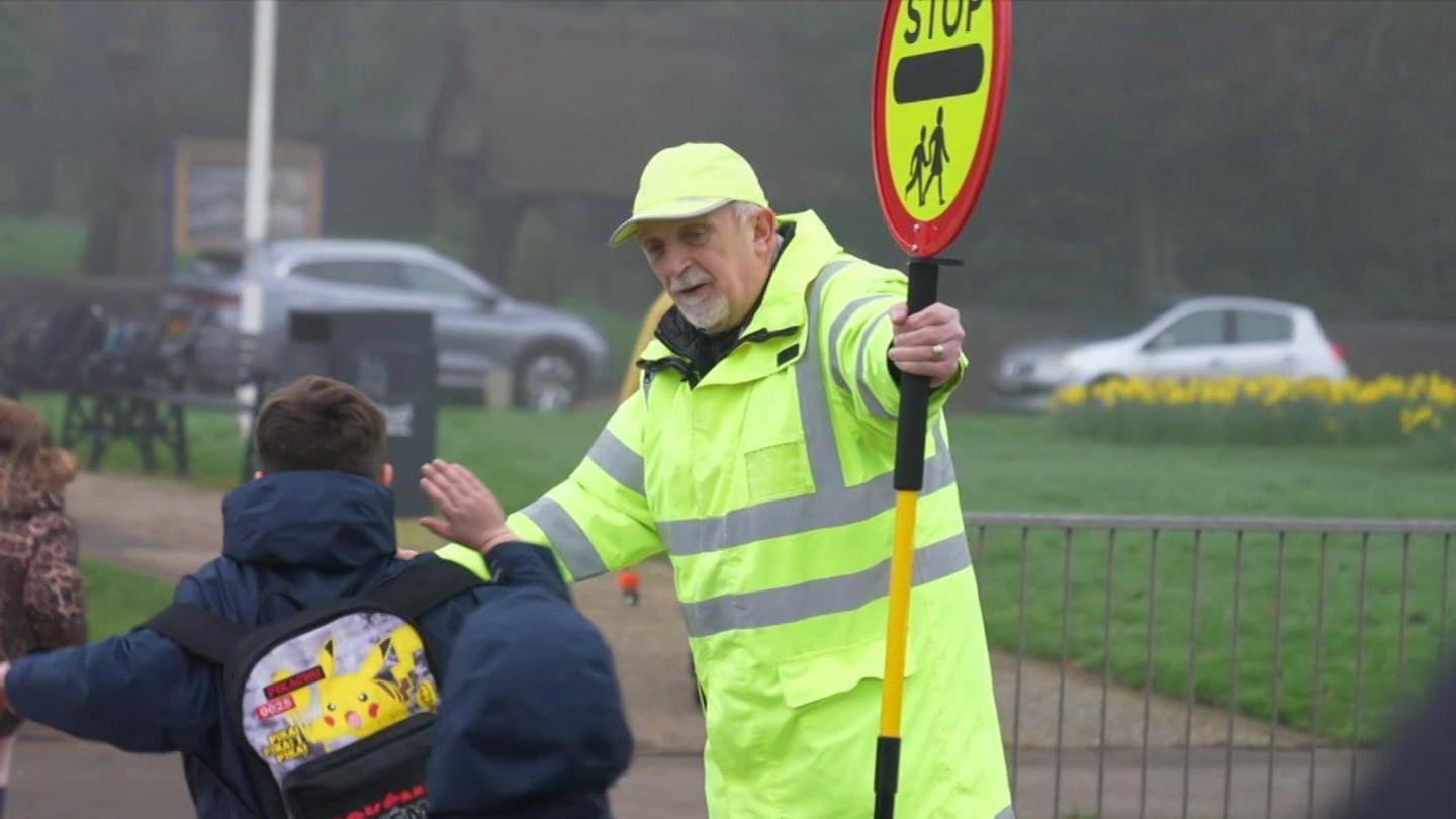Beloved Bloxwich lollipop man praised by community - BBC News