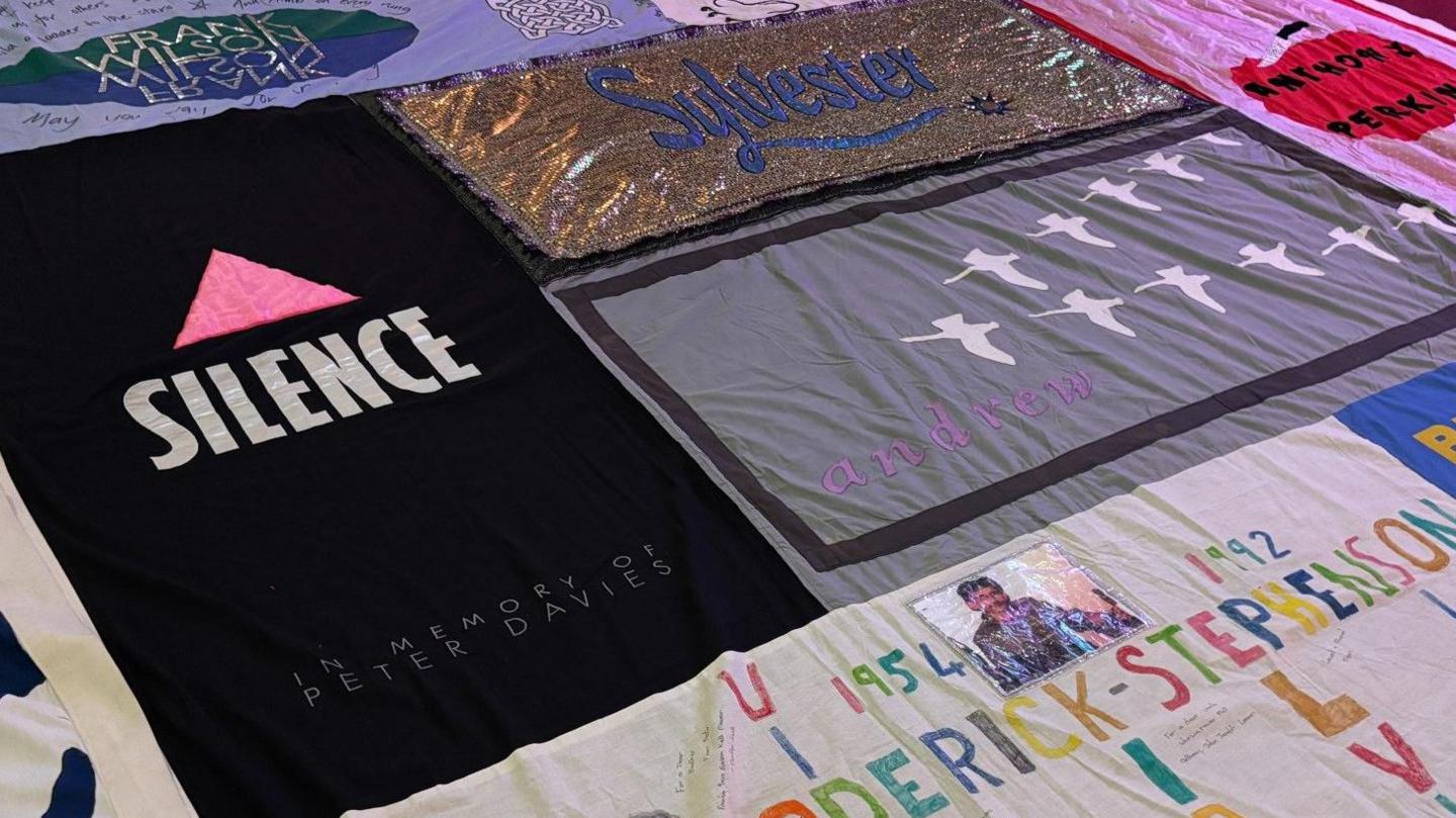 Aids quilt display marks 40 years of HIV support in Reading - BBC News