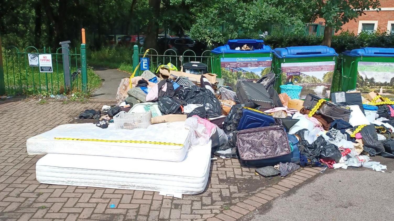 Man fined £1k after doorcam catches him fly tipping into skip - BBC News