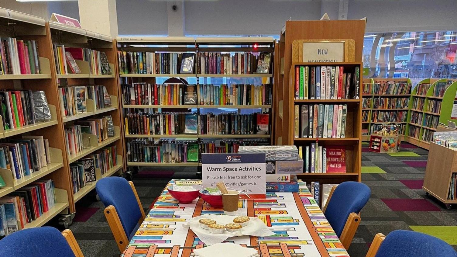 Douglas library runs coffee mornings to tackle isolation - BBC News