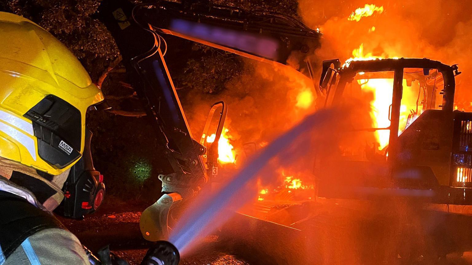 Diggers and dumper truck damaged in Market Drayton farm fire - BBC News