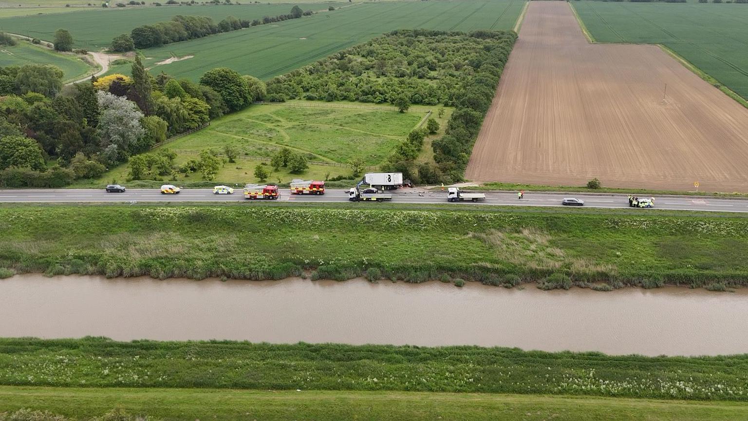 Woman dies after three-vehicle crash closes A47 near Wisbech - BBC News
