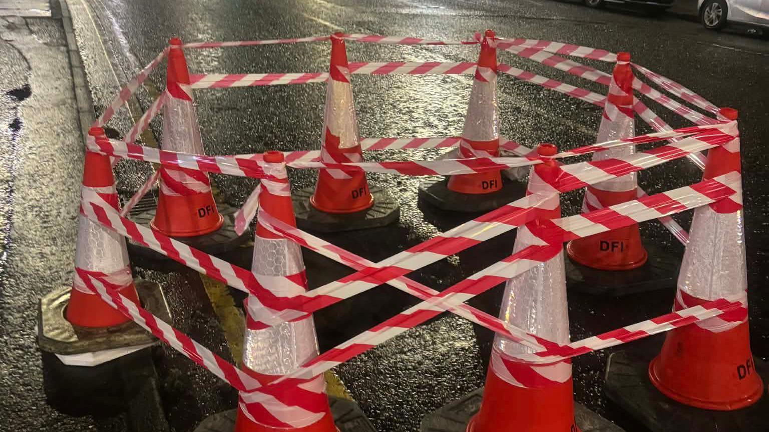 Newry: Vehicles damaged by '4ft-deep' collapsed manhole - BBC News